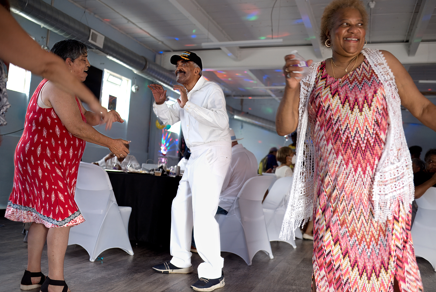 Seniors light up the dance floor at 70s themed senior prom (photo of ...